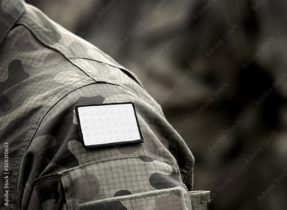 White flag on military uniform. White flag is sign of truce or ...