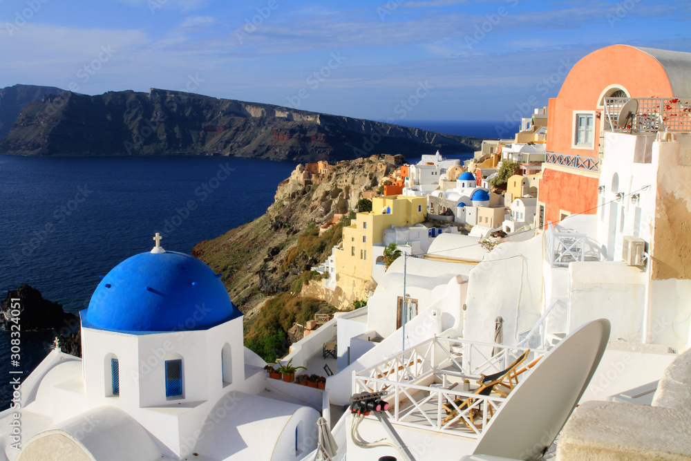 One of the many stunning views of the blue rooftops in Santorini ...