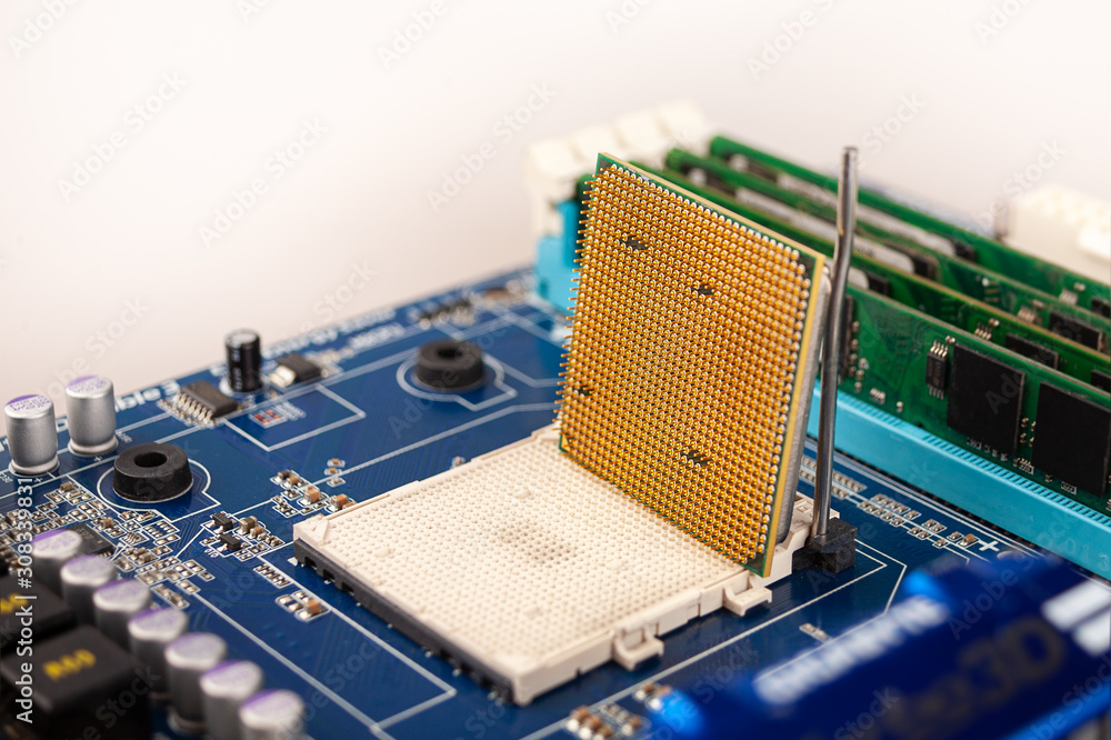 computer CPU close-up on the motherboard background, socket of central process unit, connection ...