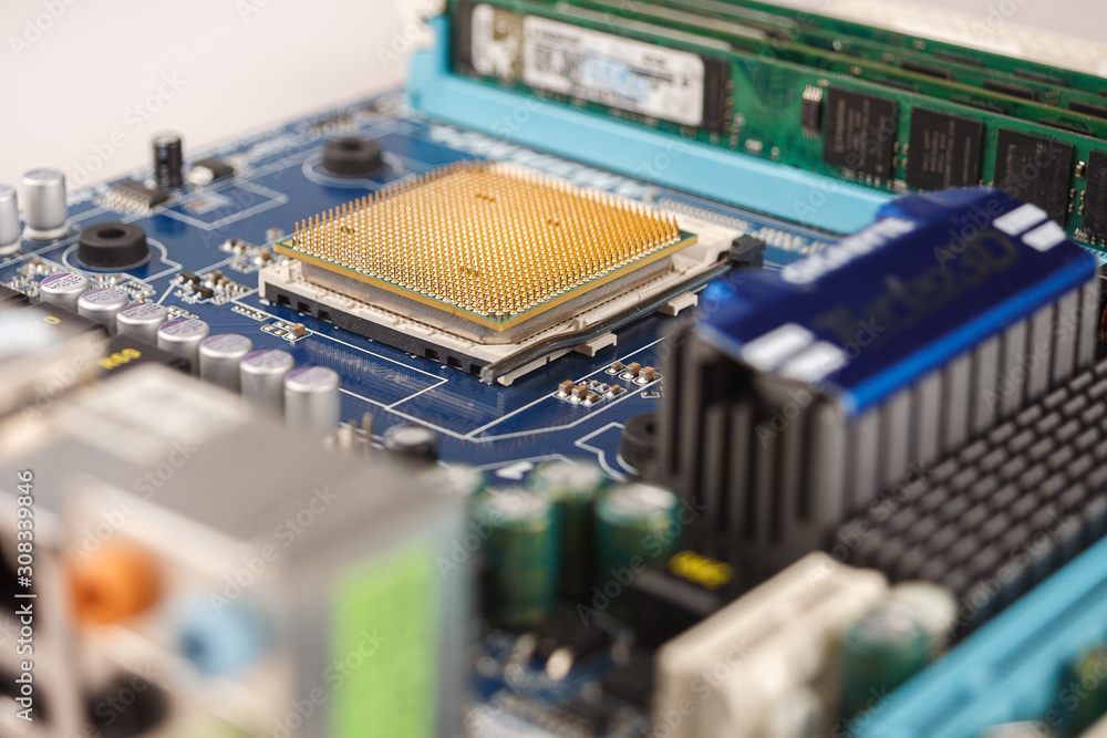 computer CPU close-up on the motherboard background, socket of central process unit, connection ...