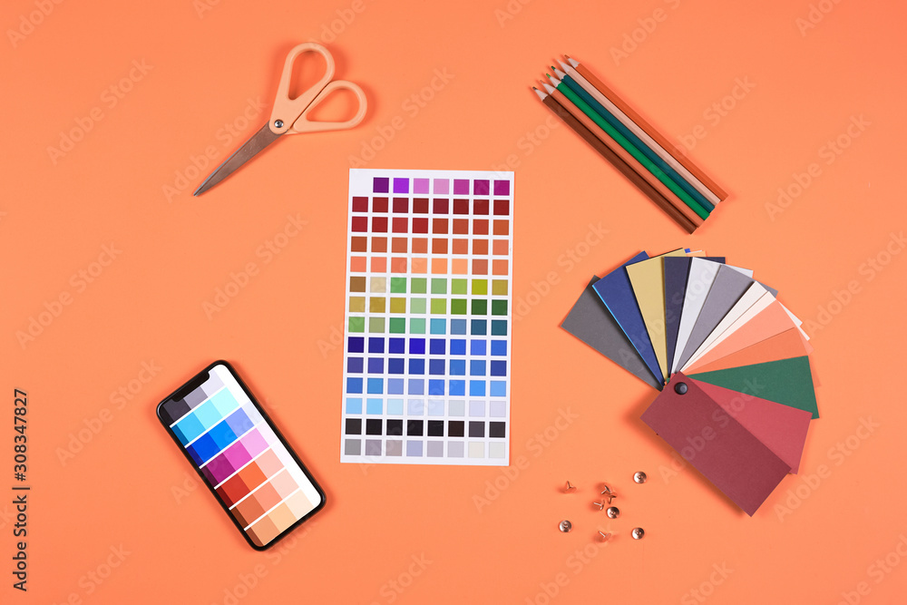 Above view flat lay of color palette samples and swatches at designers ...