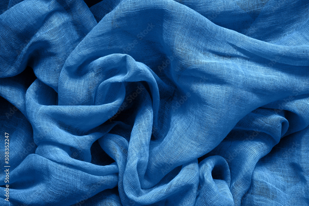 Blue cotton fabric background. Color of the year 2020 classic blue ...