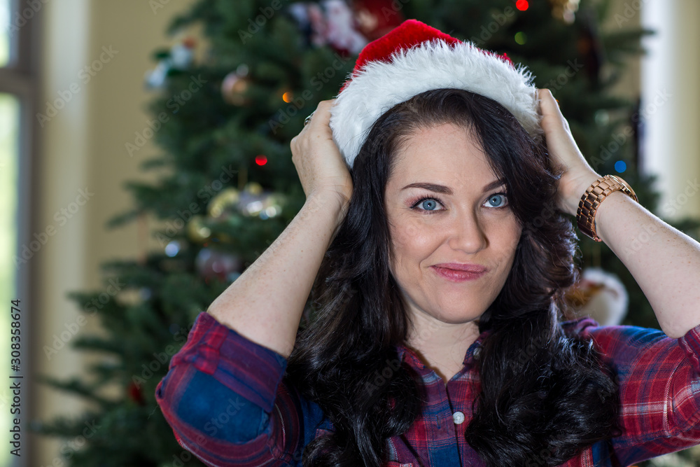 Beautiful woman with a quirky look on her face Stock Photo | Adobe Stock