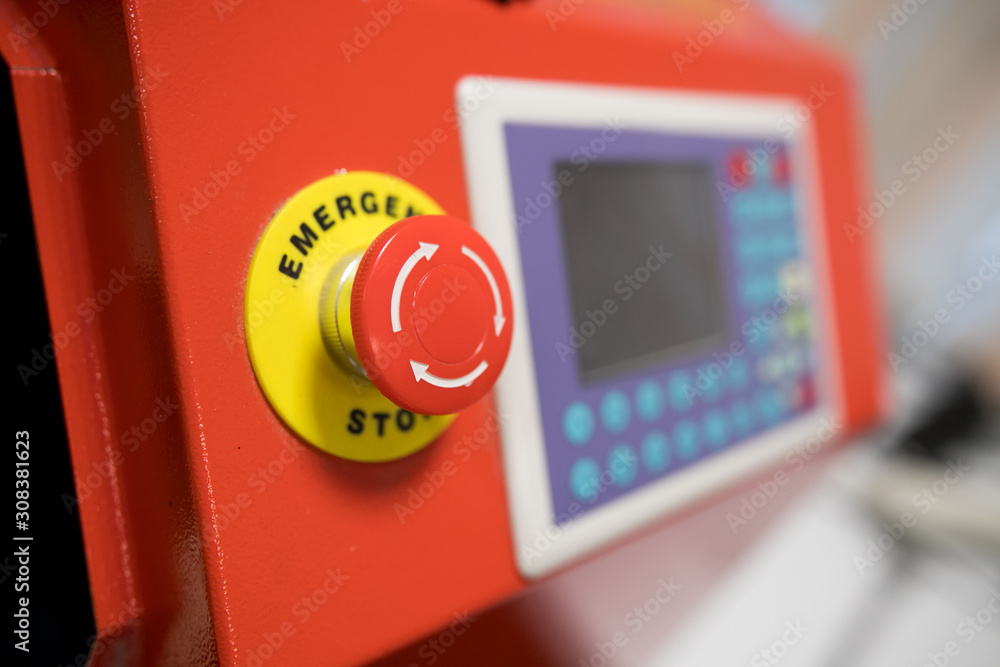 The red emergency button or stop button for Hand press. STOP Button for ...
