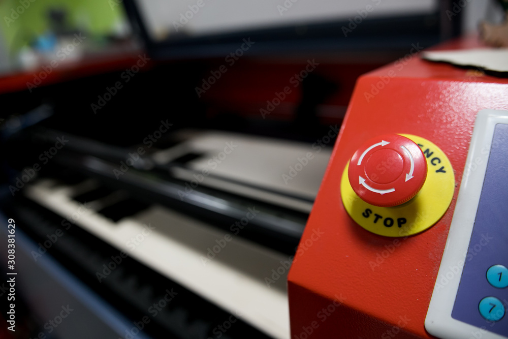 Fotka „The red emergency button or stop button for Hand press. STOP ...