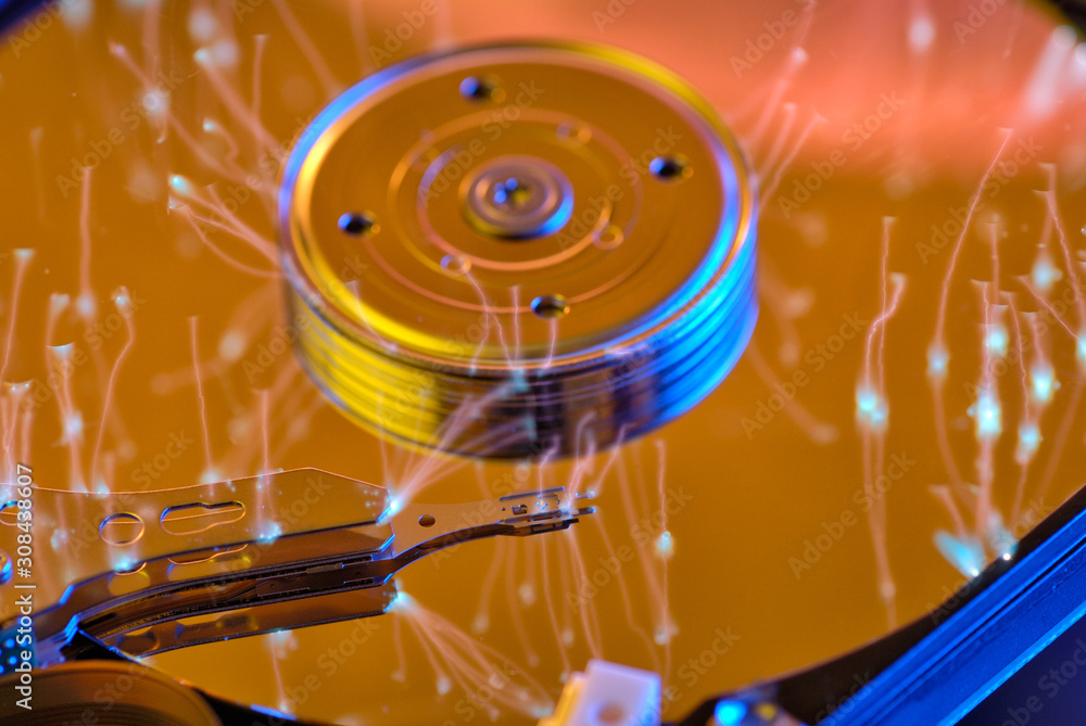 Inside of hard disk drive with electricity discharge lightning effect ...