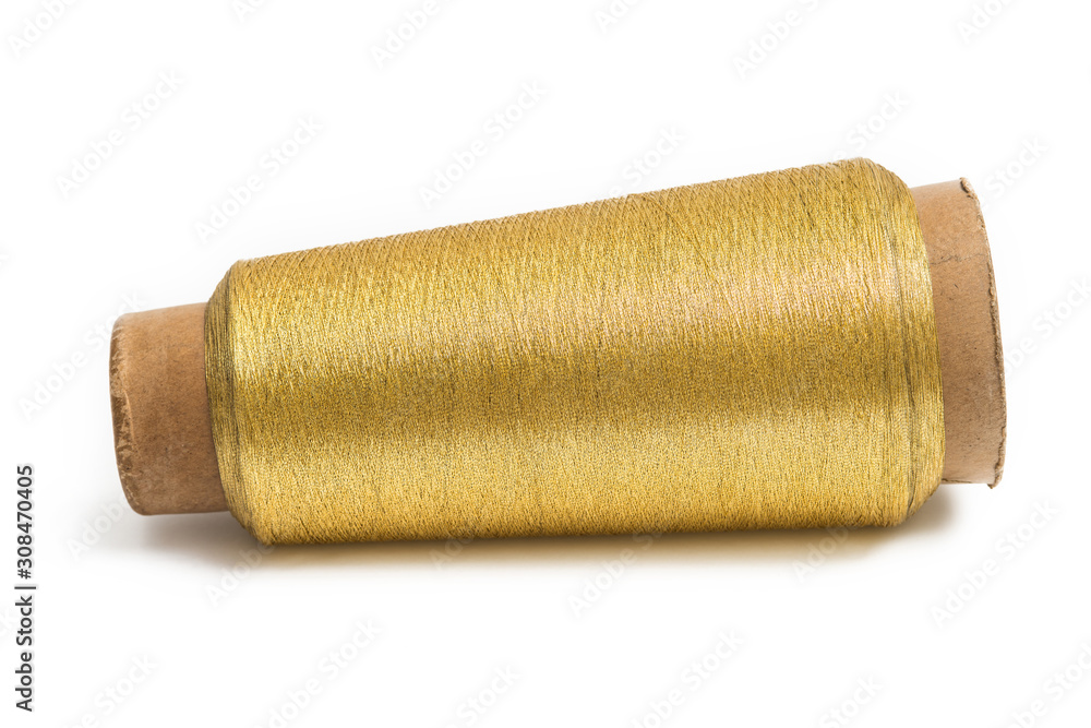 Spool of gold thread isolated on white background. Stock Photo | Adobe ...