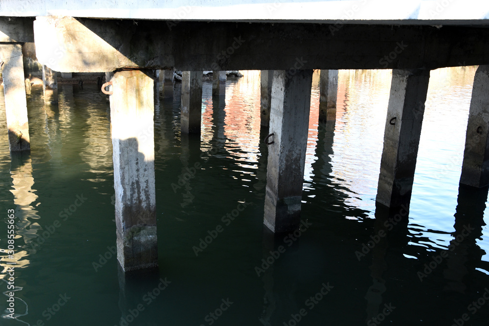 Concrete piles of a column, a reflection of the environment in the ...