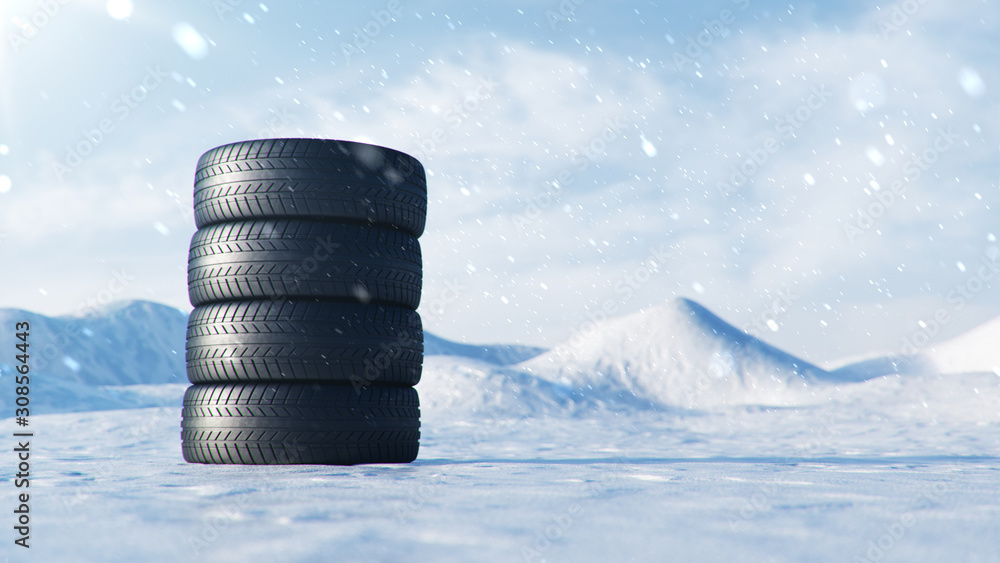 Winter tires on a background of snowstorm, snowfall and slippery winter ...