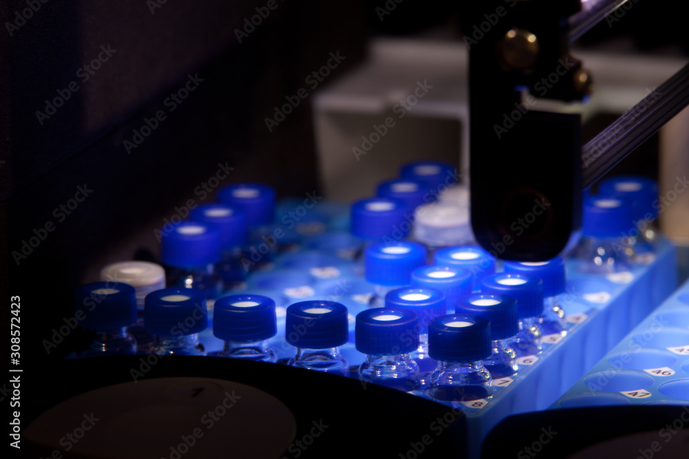 Sample bottles in pharmaceutical laboratory spectrometer Stock Photo ...