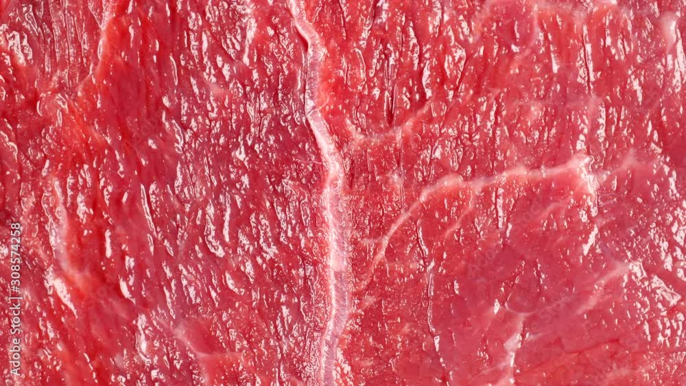 Marble beef rotating. Meat texture, background. Surface of uncooked ...