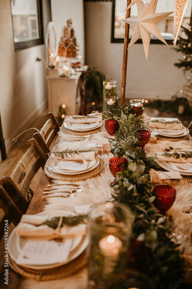 Christmas table setting for traditional lunch or dinner on a rustic ...