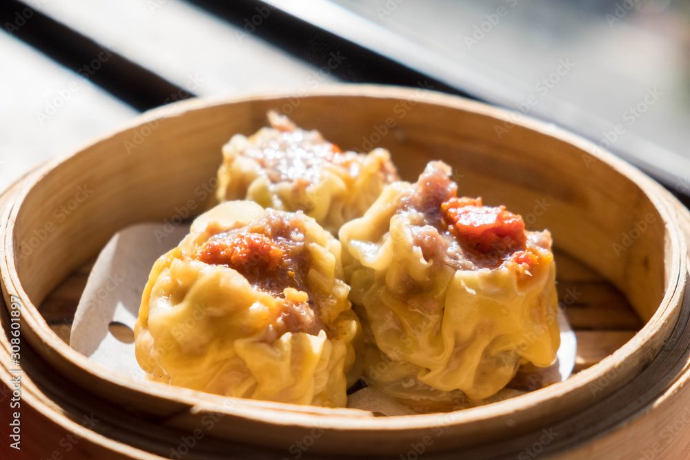 Shumai (Siu Mai, Shao Mai) served as classic Dim Sum on wooden ...