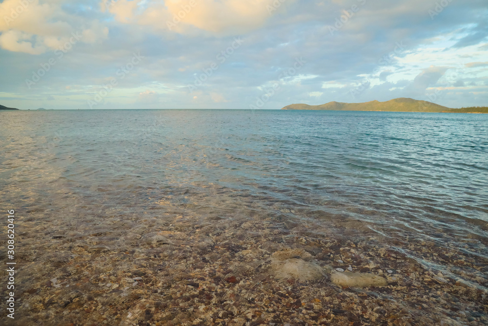 Twilight at Coral Beach near Shute Harbour in Queensland. Beach full of ...