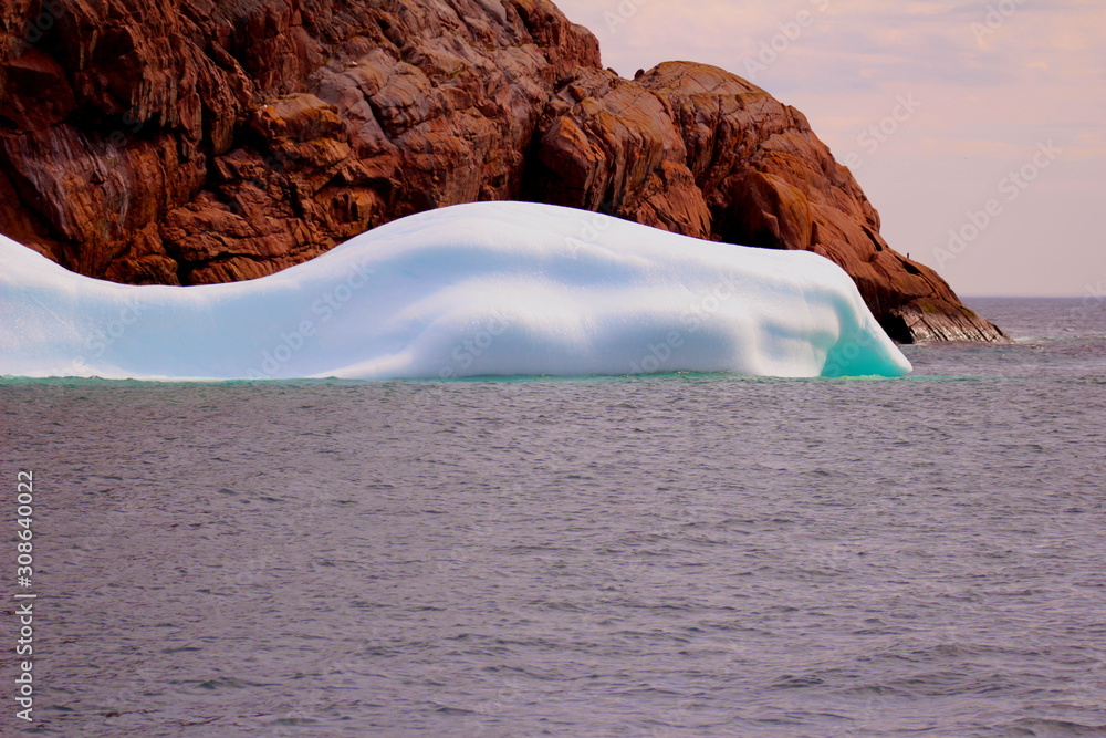 Iceberg with coastal ocean cliffs, ice floating in the sea, amazing ...