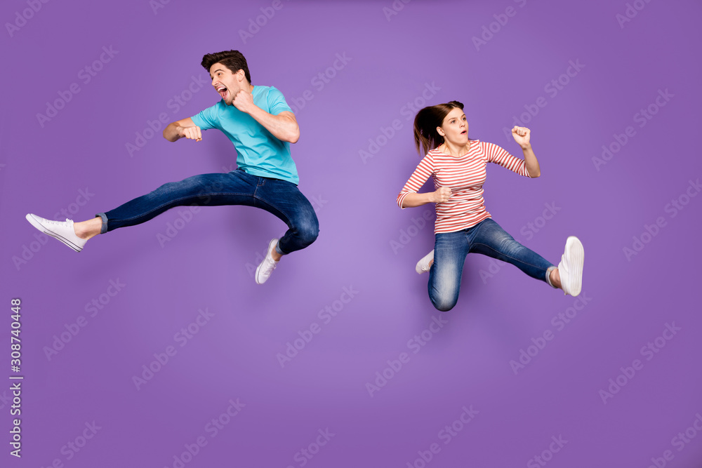 Full body photo of funny two people guy lady jumping high training ...