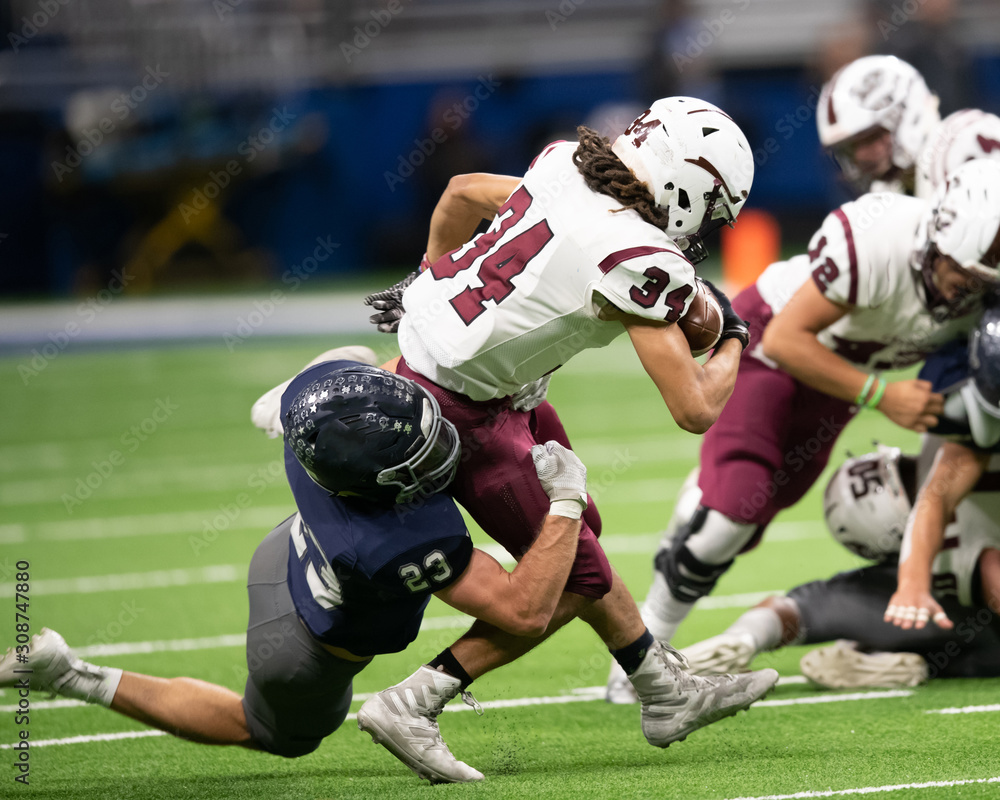 Great action photos of football players making amazing plays during a ...