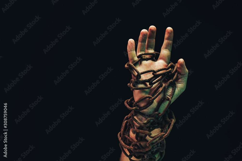 Human hand are chained in chains isolated on black background. Stock ...