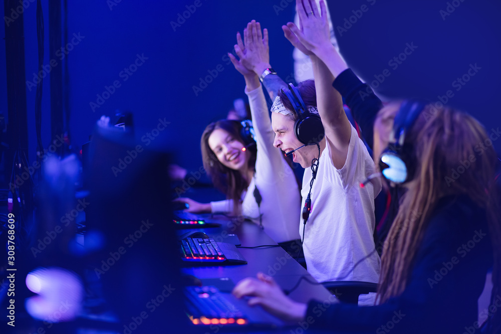 Team professional gamer playing winning tournaments online games ...