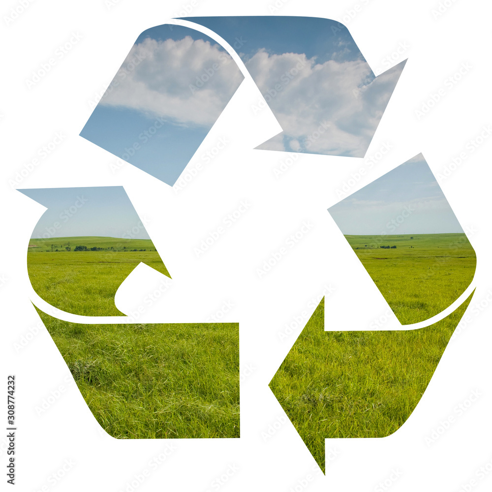 Recycling logo isolated on white, with an image of spring prairie with ...