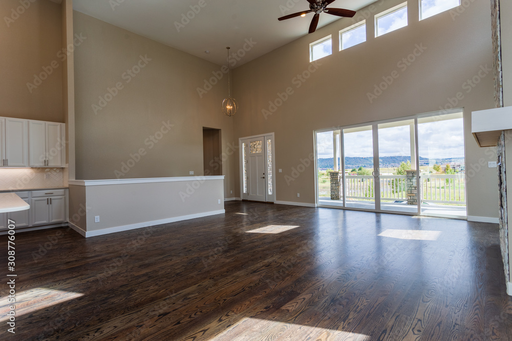 Great room with clerestory, high ceiling, window-wall, and sliding ...