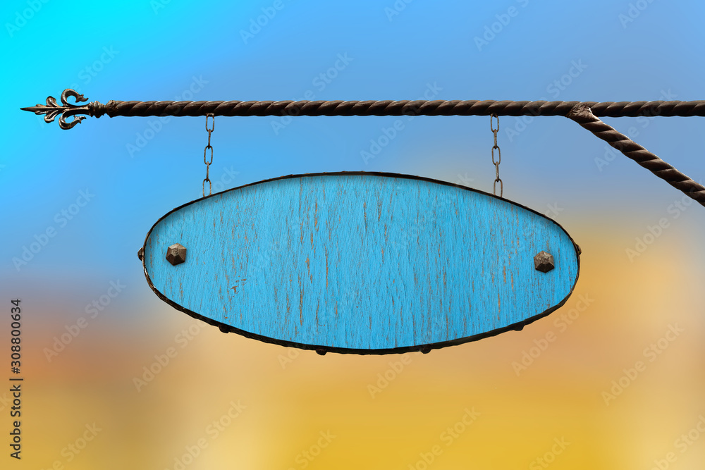 Wooden signboard forged. Blue wood shop signs without text hanging on ...