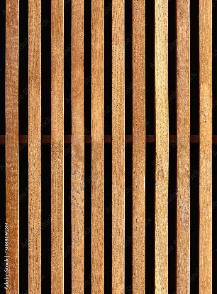 Seamless texture of wooden decorative battens placed vertically on ...