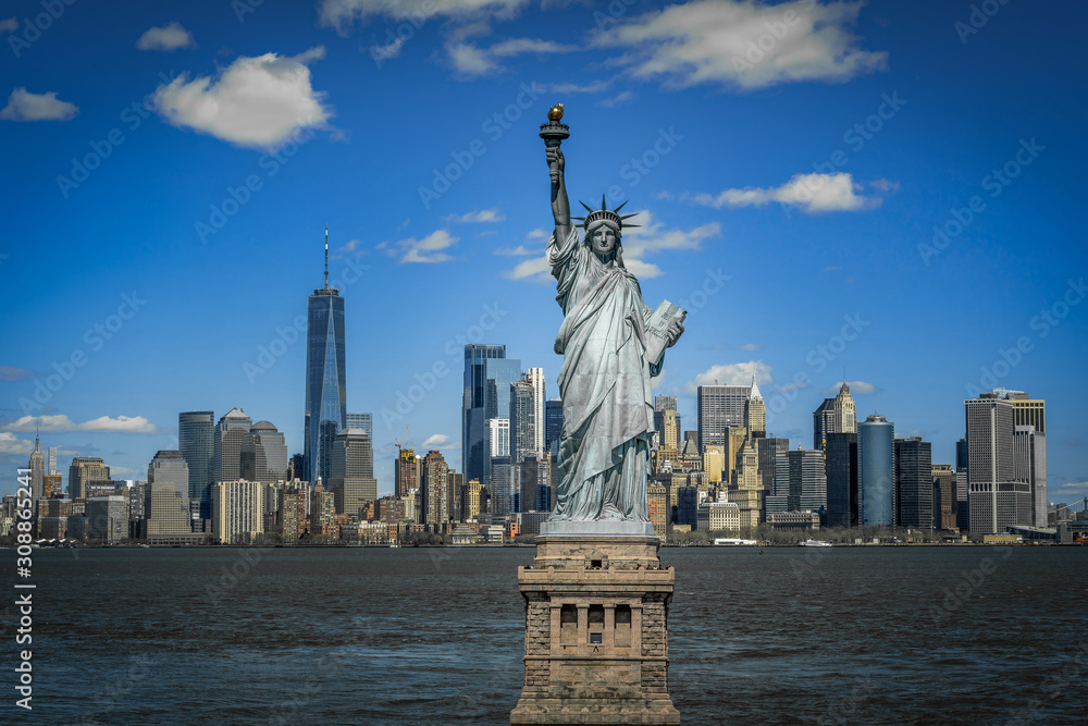The Statue of Liberty over the Scene of New york cityscape river side ...