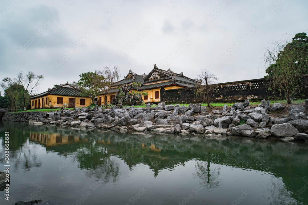 Ancient palace in Hue, Vietnam. Pond in front of the Imperial Palace ...