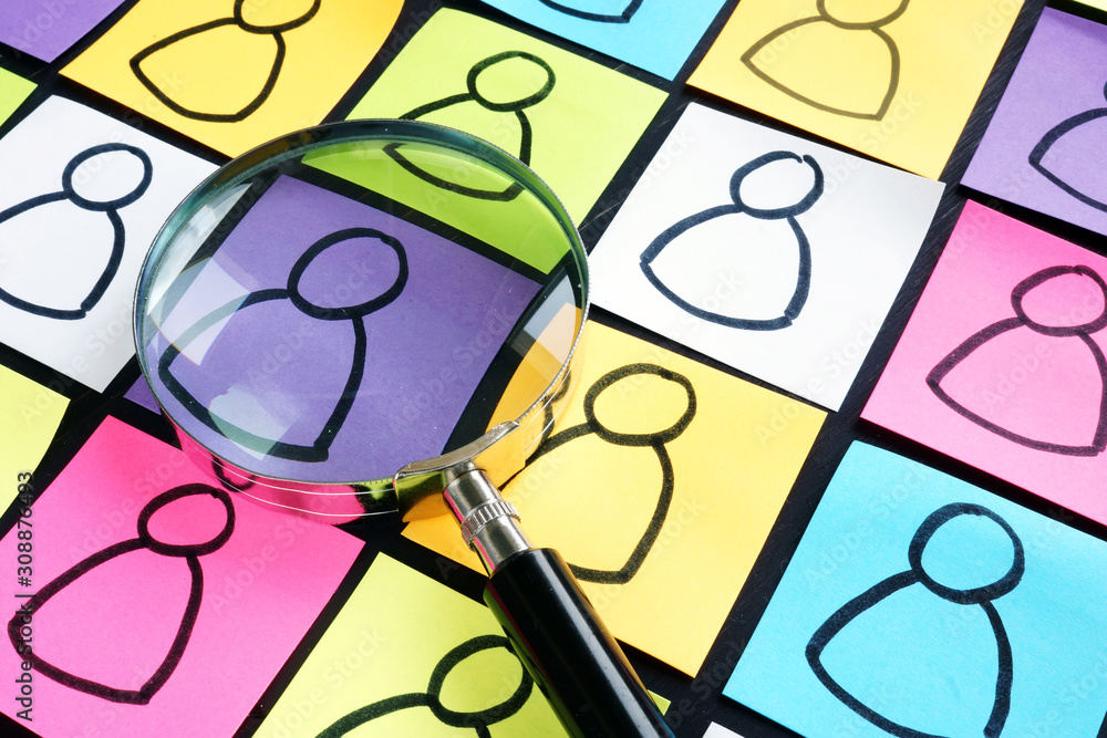 Customer Segmentation concept. Multicolored sheets with figures and ...