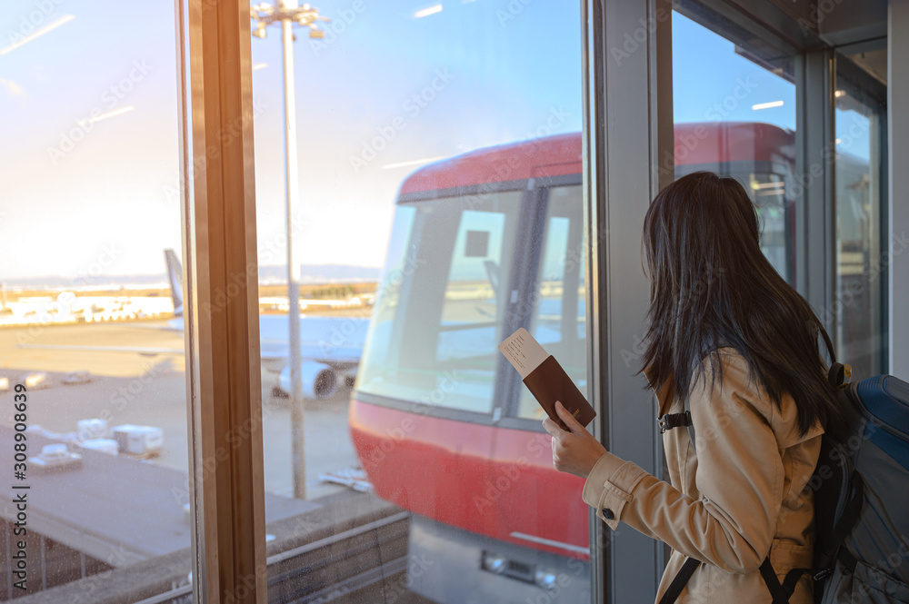 passenger tourist holding passport and boarding pass waiting for ...