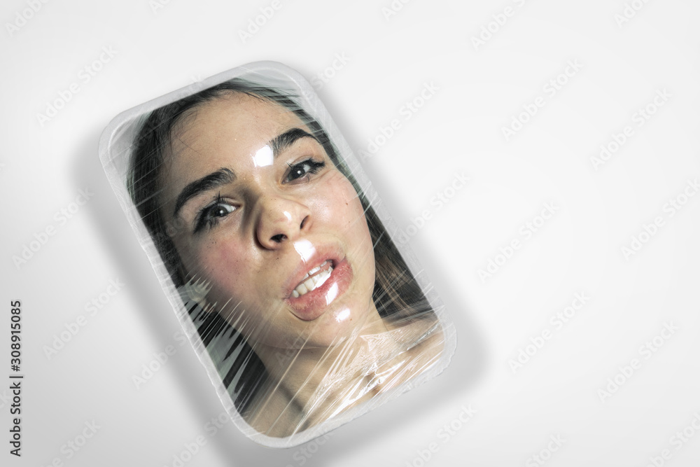 Cold. Human head as a goods in plastic box on white background, ecology ...