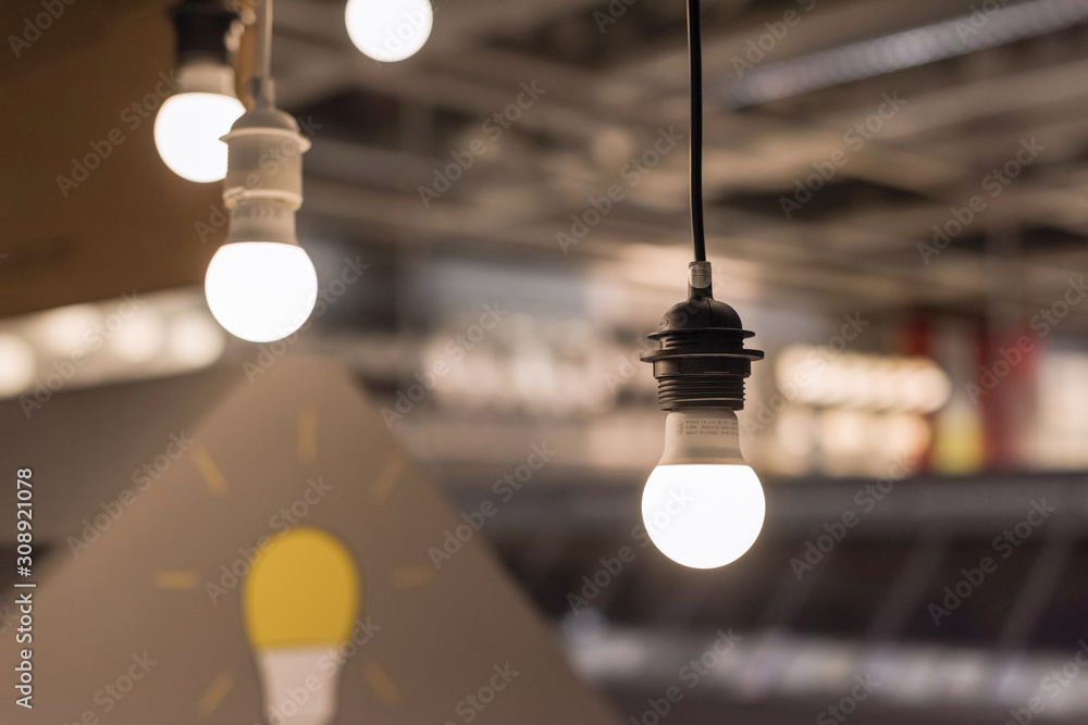 Blurred background of electrical good department in hardware store with ...