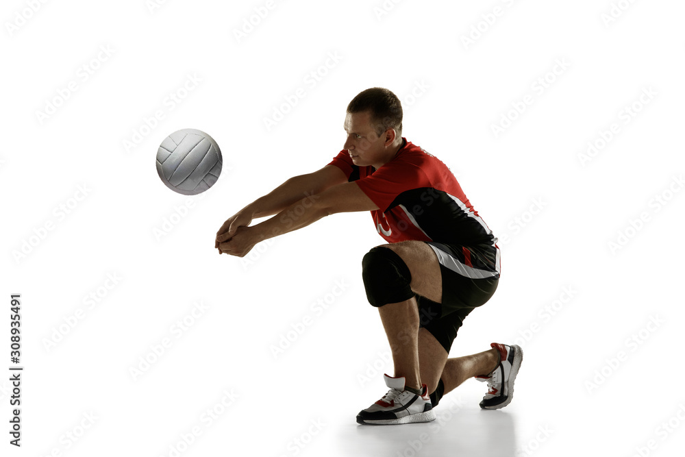 Young caucasian volleyball player placticing isolated on white ...