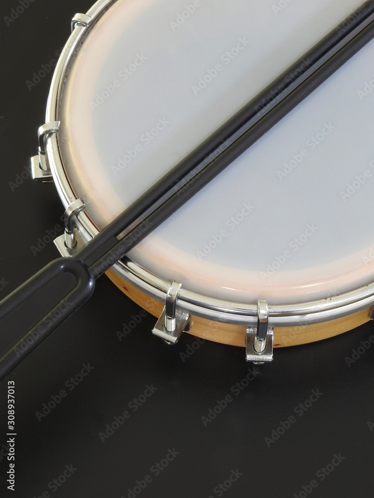 Tamborim with drumstick: a Brazilian percussion musical instrument. It ...