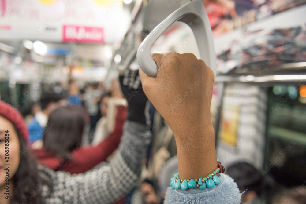 Safety travel trip, young passenger woman hand holding Handle on the ...