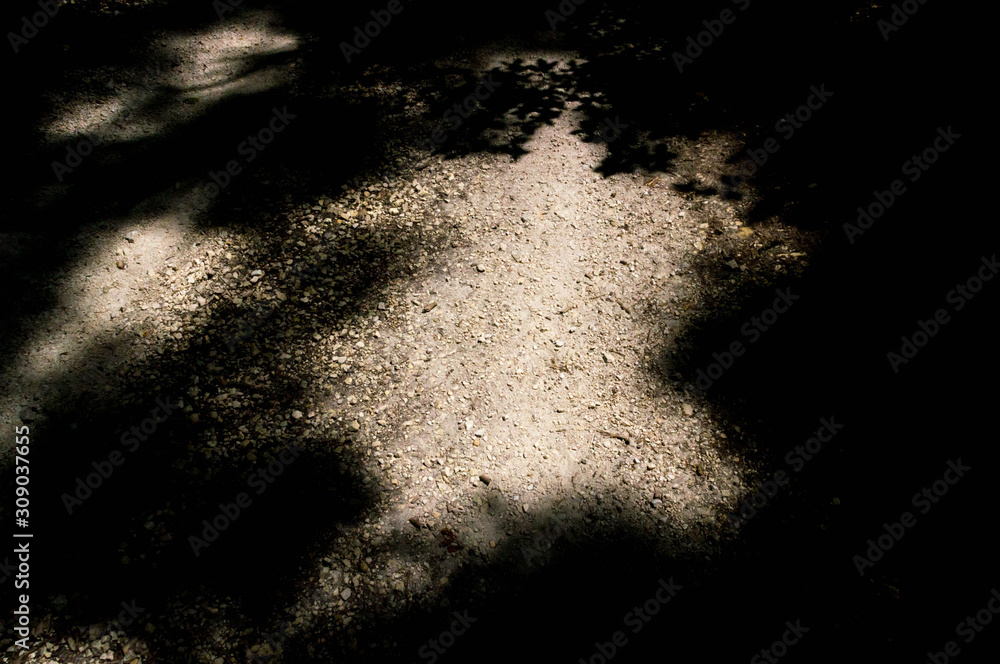 Bright light spot on dirt road Stock Photo | Adobe Stock