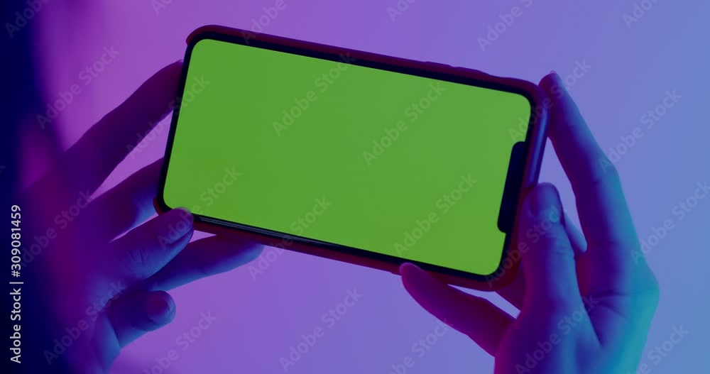 GREEN SCREEN CHROMA KEY CU Caucasian female holding modern smart phone ...
