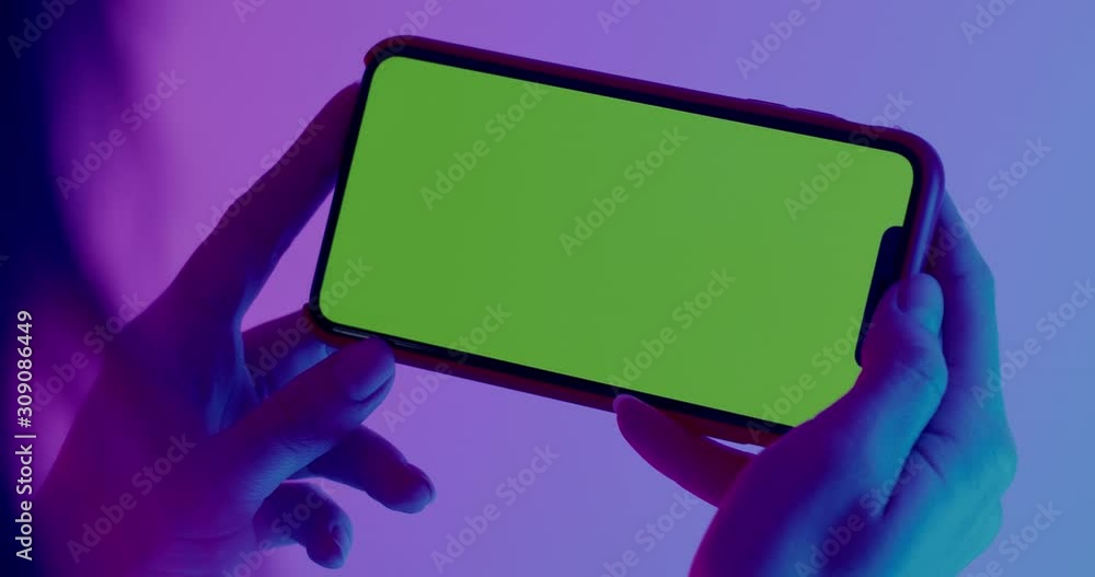 GREEN SCREEN CHROMA KEY CU Caucasian female holding modern smart phone ...