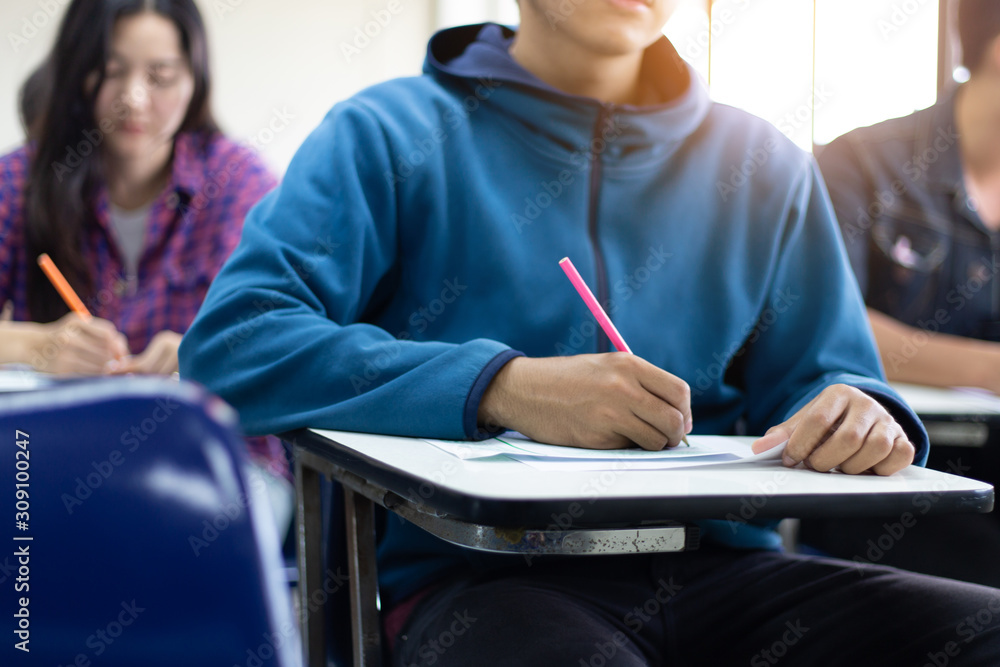 high school,university student study.hands holding pencil writing paper ...