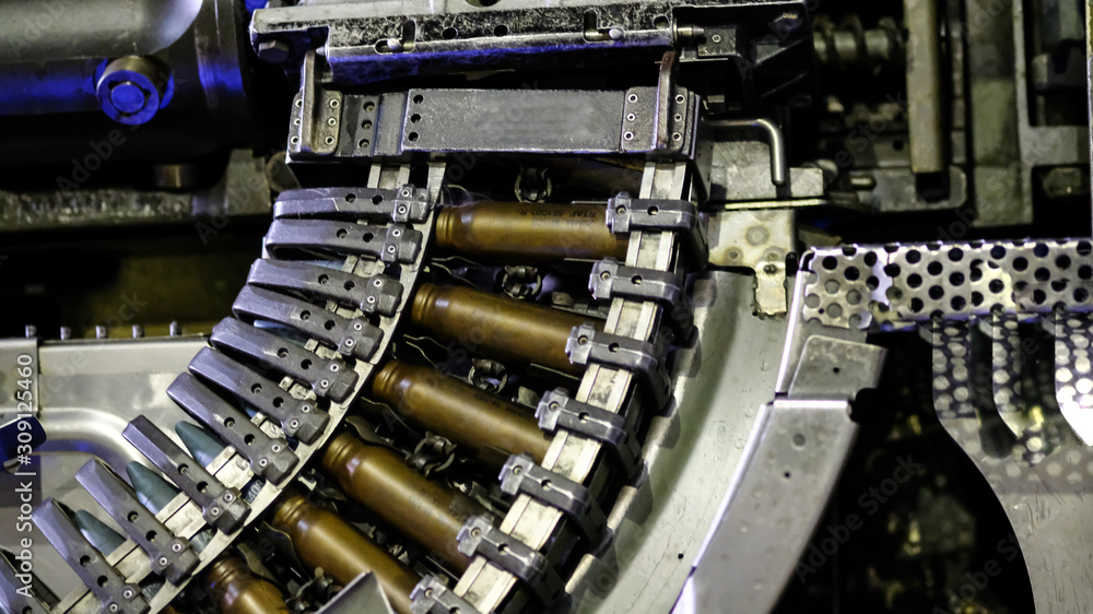 A gun on a plane, Machine gun mounted on the plane shot close up. Stock ...
