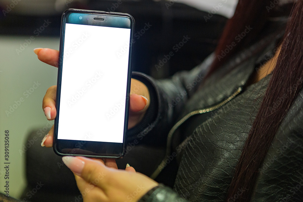 girl holding a mobile smartphone with a clear white screen. mobile ...