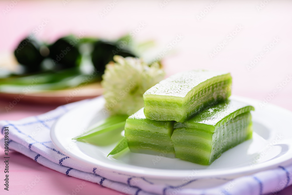 Thai dessert (Khanom chan), steamed layer sweet cake with pandan flavor ...