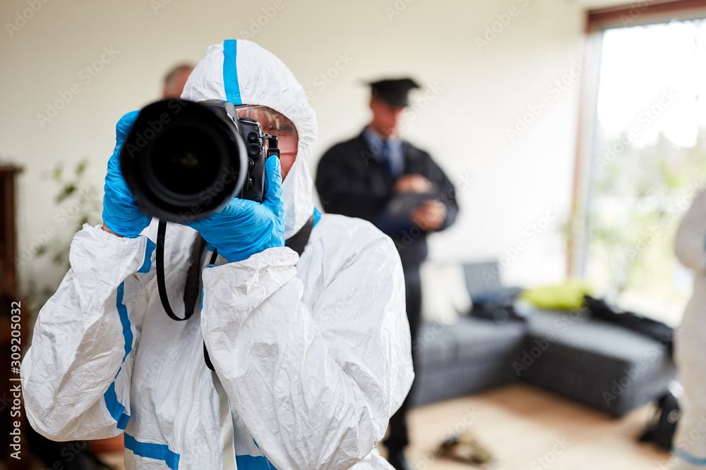 Photographer of police at crime scene with forensics Stock Photo ...