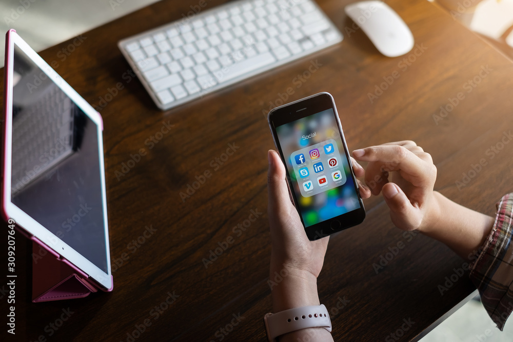 CHIANG MAI, THAILAND - JULY 02, 2018: Hand of man using Iphone 6 with ...
