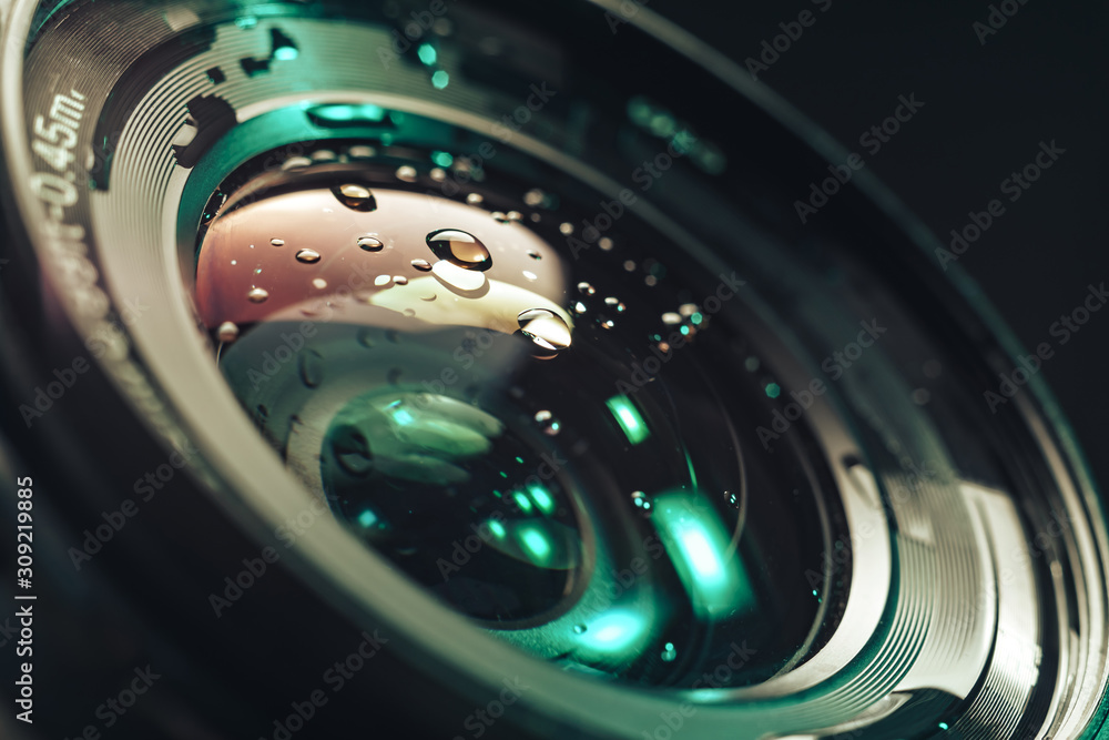 Close up beautiful Camera lens of drop water, aqua menthe light ...