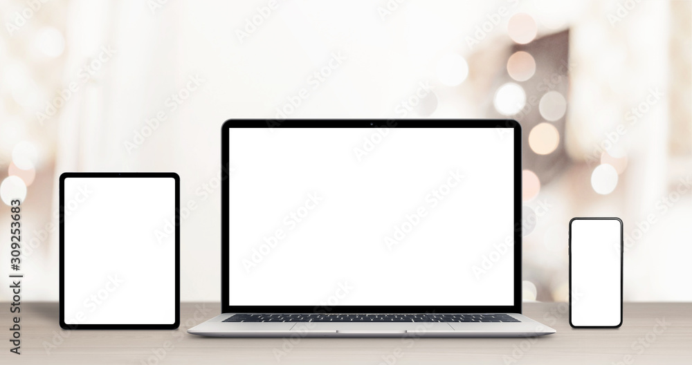 Phone, tablet and laptop computer mockup on work desk for responsive ...