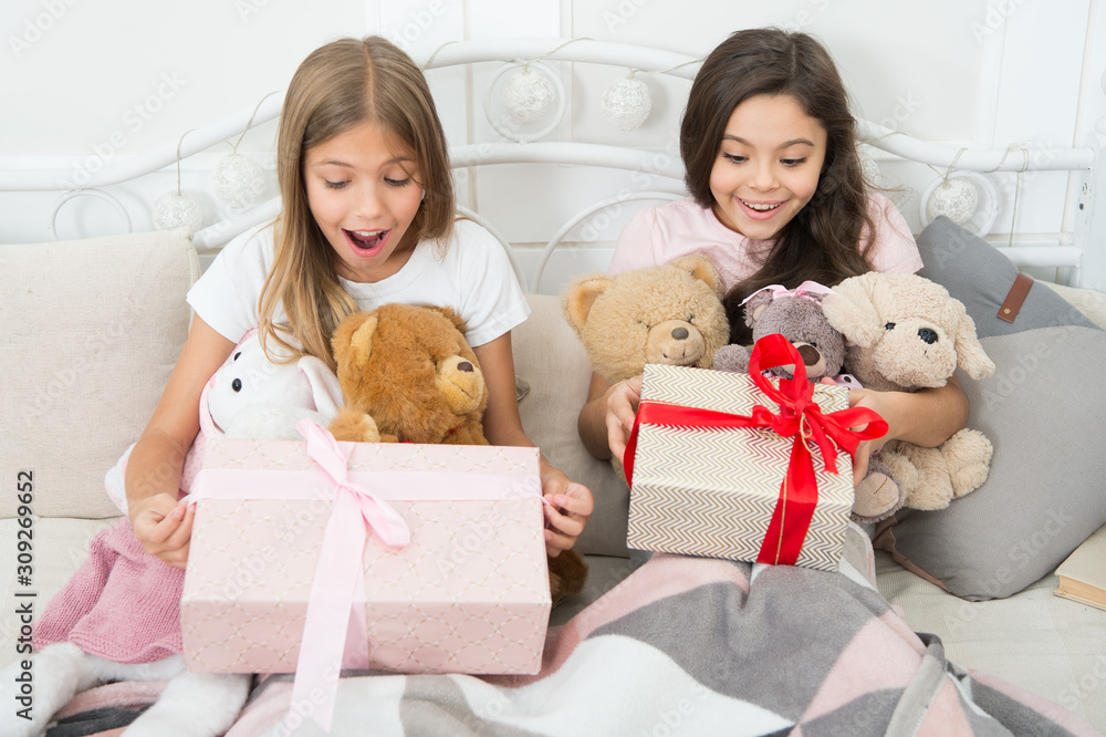 Surprise inside. Surprised children in morning. Little girls open ...