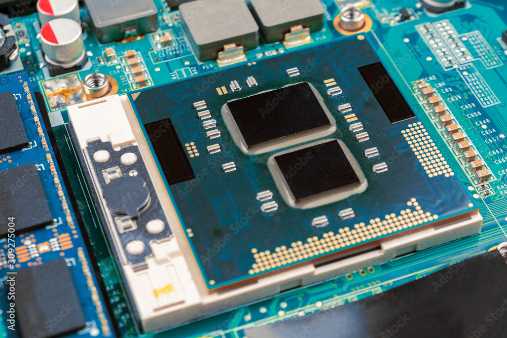 computer CPU close-up on the motherboard background, socket of central process unit, connection ...