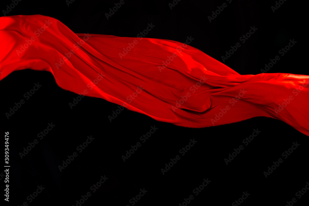 Red Cloth fly in the air, Reddish satin fabric throws like strong wind ...